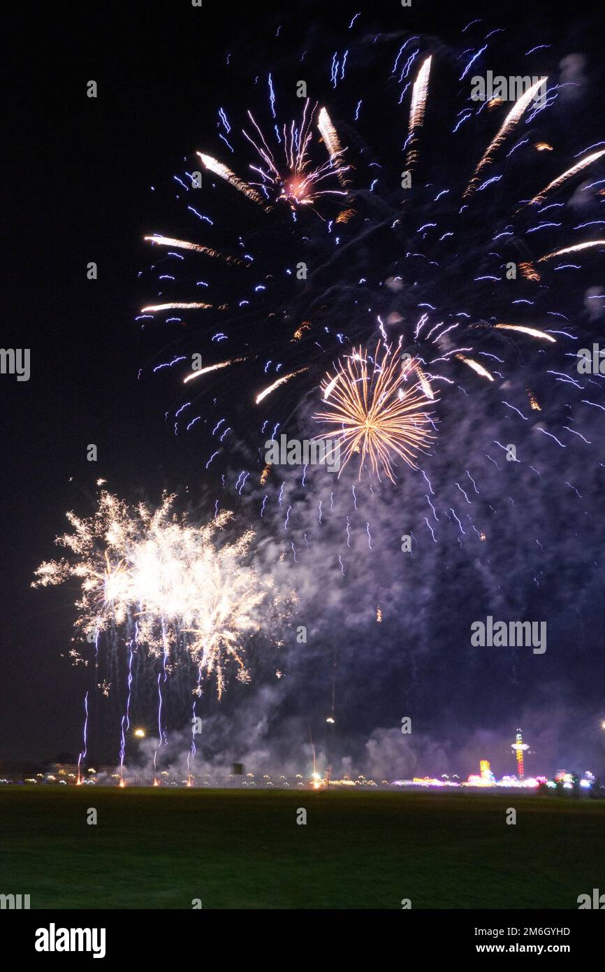 A long exposure with slow shutter speed of Fireworks exploding in the ...