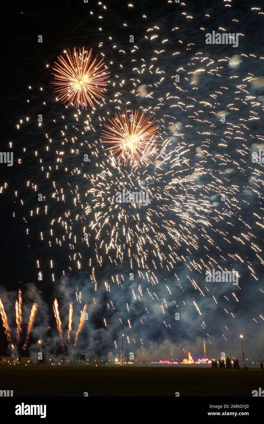 A long exposure with slow shutter speed of Fireworks exploding in the ...