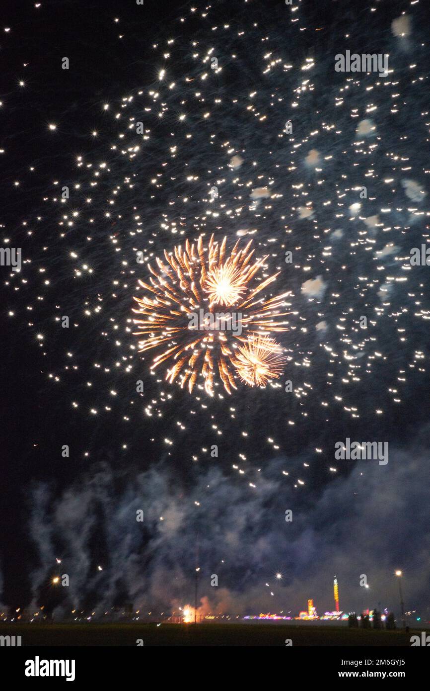 A long exposure with slow shutter speed of Fireworks exploding in the ...