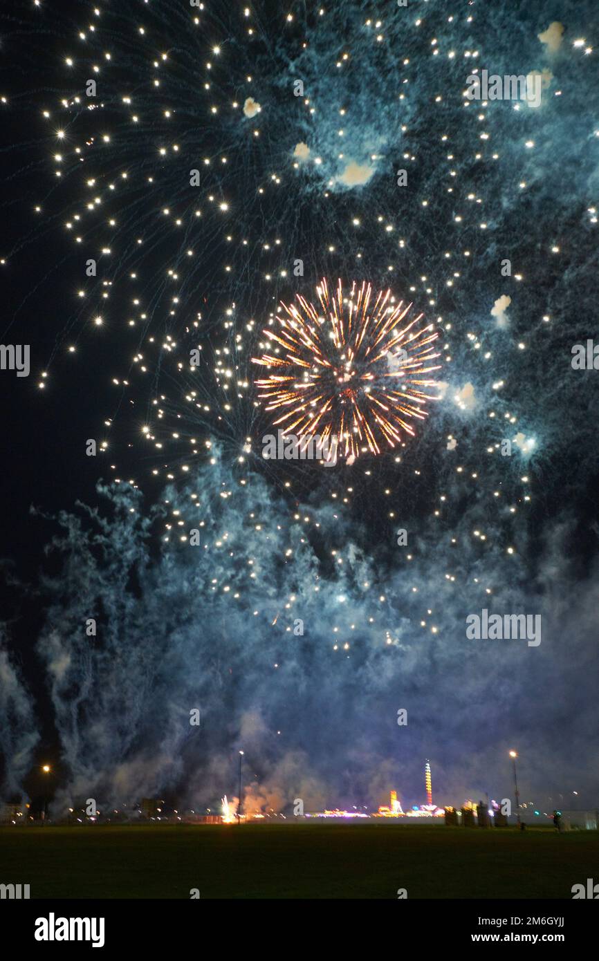A long exposure with slow shutter speed of Fireworks exploding in the ...