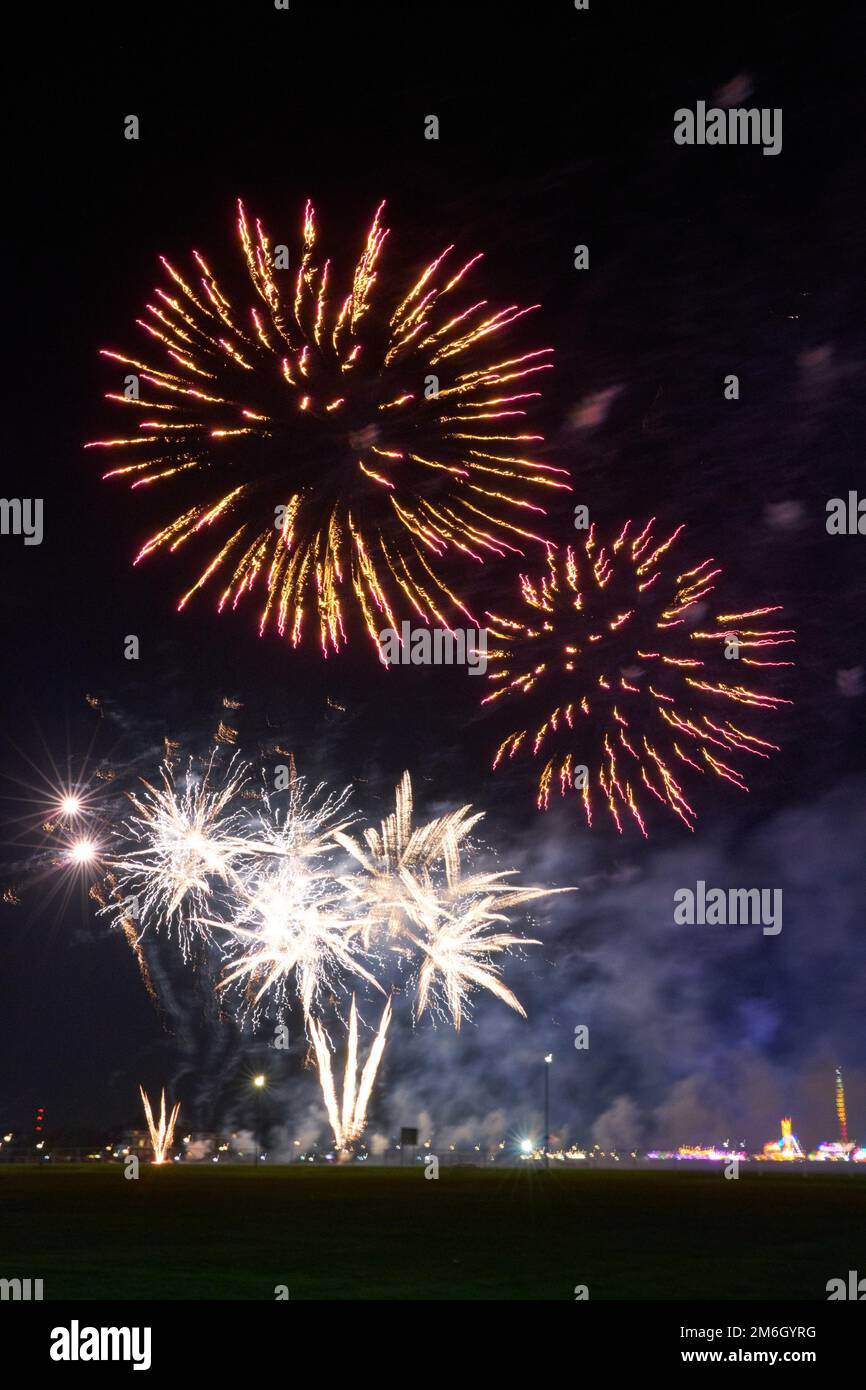 A long exposure with slow shutter speed of Fireworks exploding in the ...