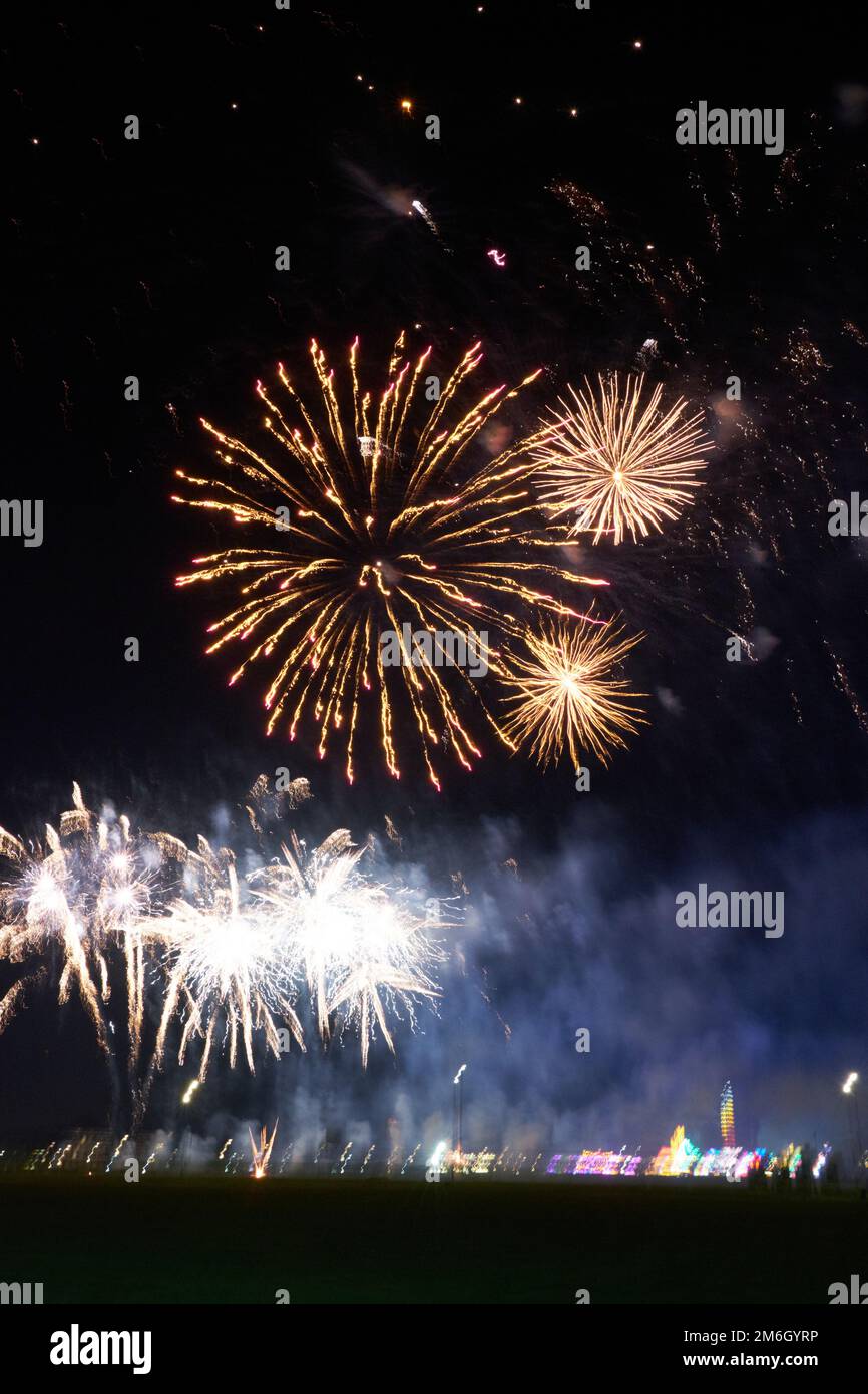 A long exposure with slow shutter speed of Fireworks exploding in the ...