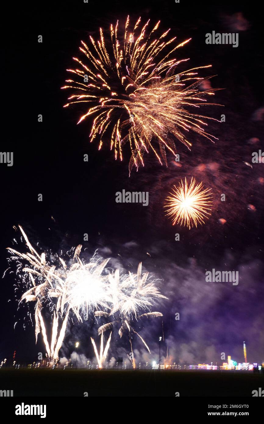 A long exposure with slow shutter speed of Fireworks exploding in the ...