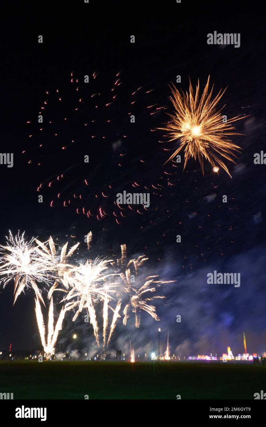 A long exposure with slow shutter speed of Fireworks exploding in the ...