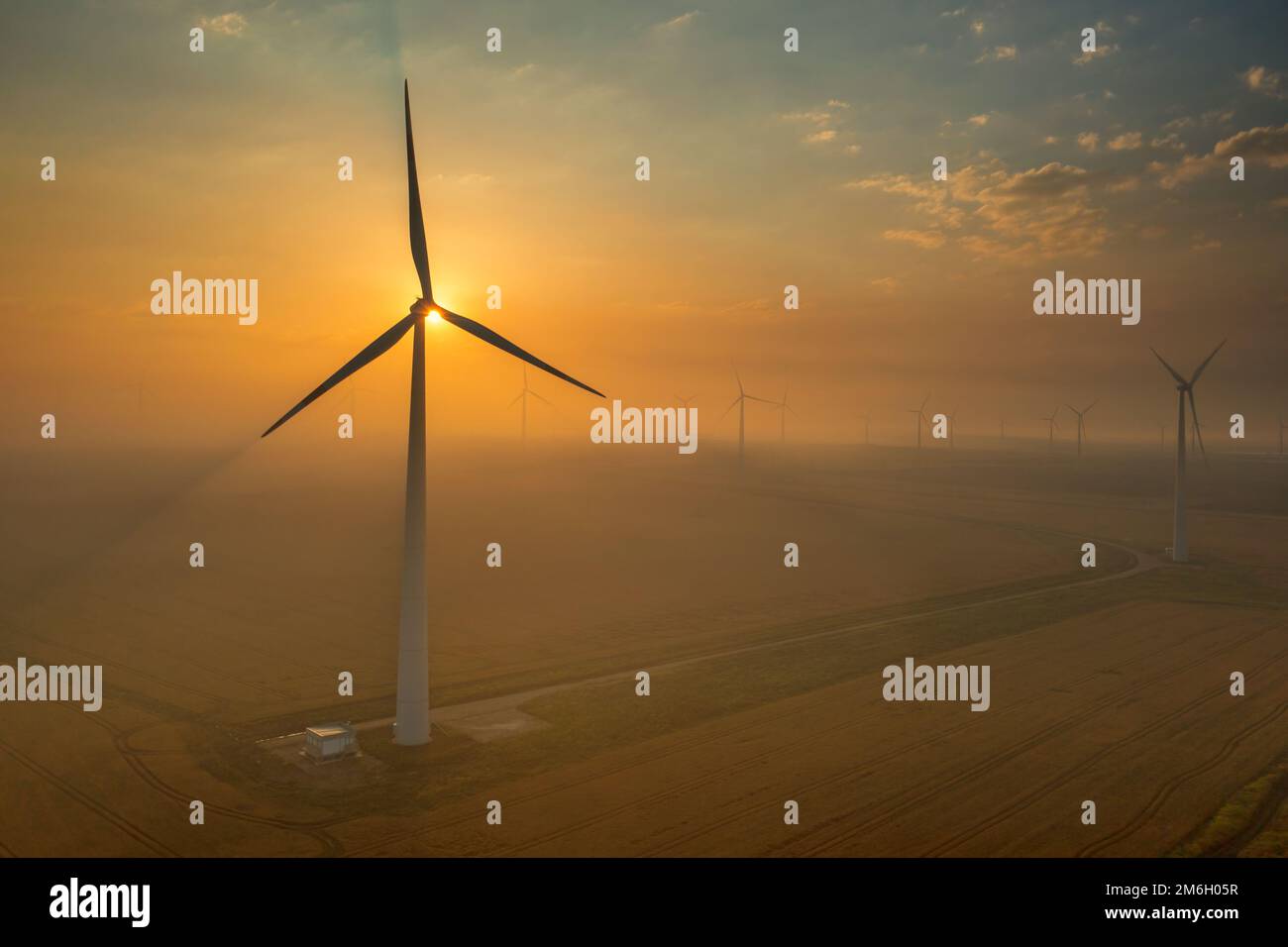 Aerial flying sunset over renewable hi-res stock photography and images ...