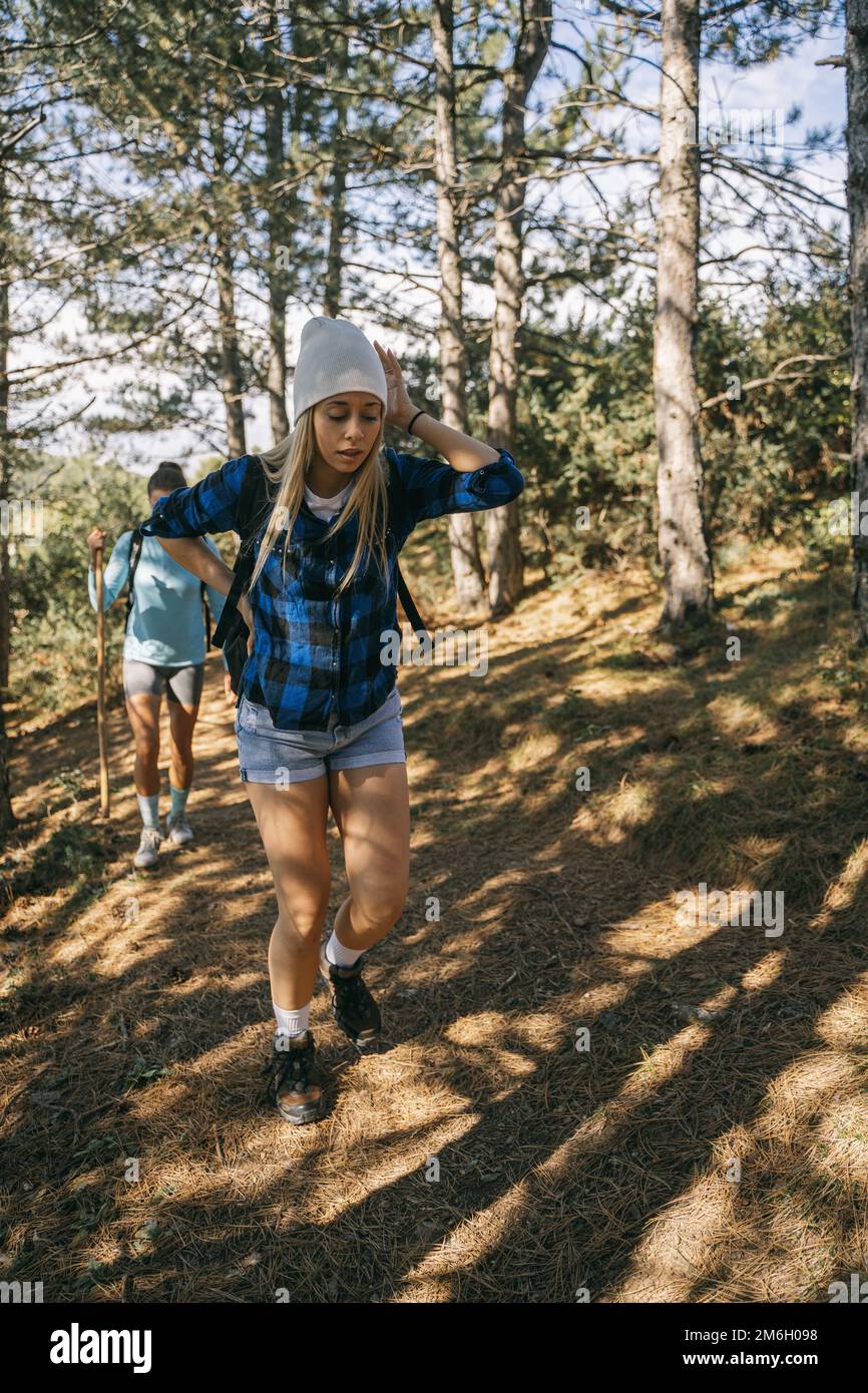 Two pretty girls hiking at the mountain Stock Photo - Alamy