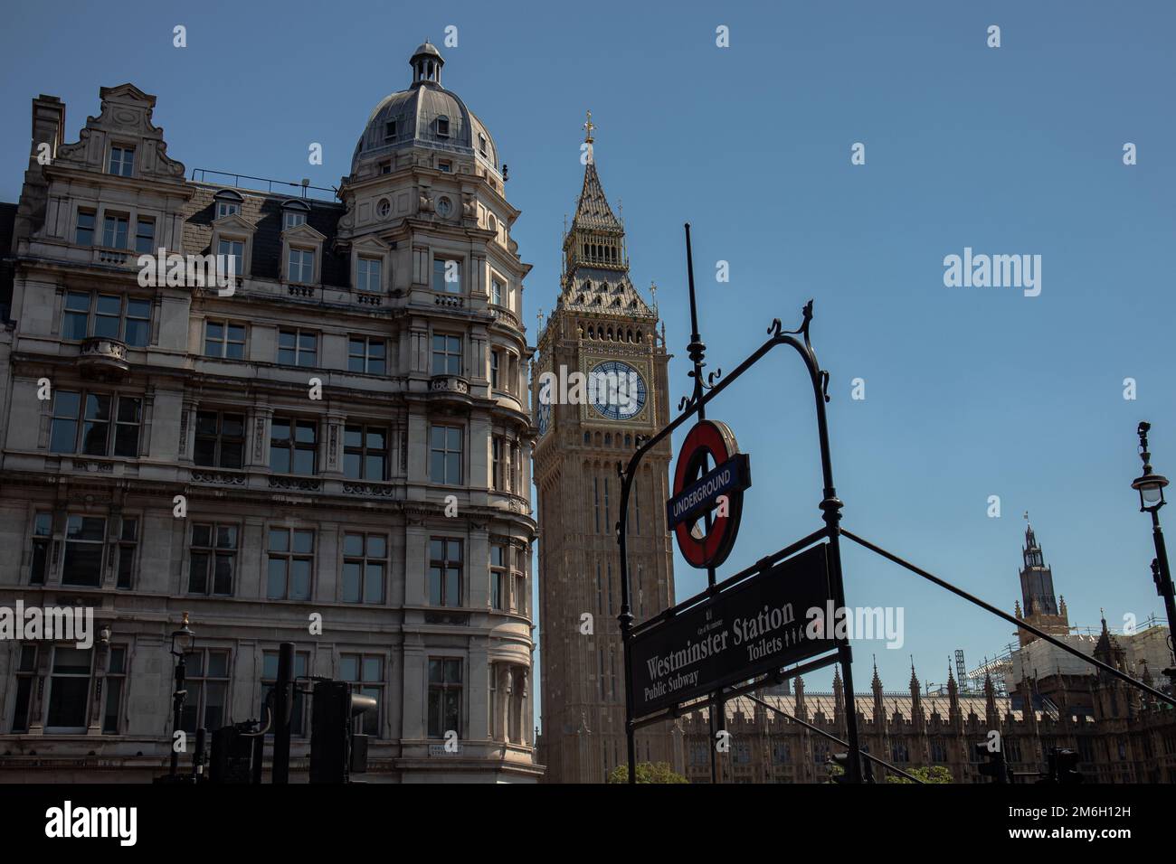 A beautiful shot of the Westminster underground station with Big Ben in ...