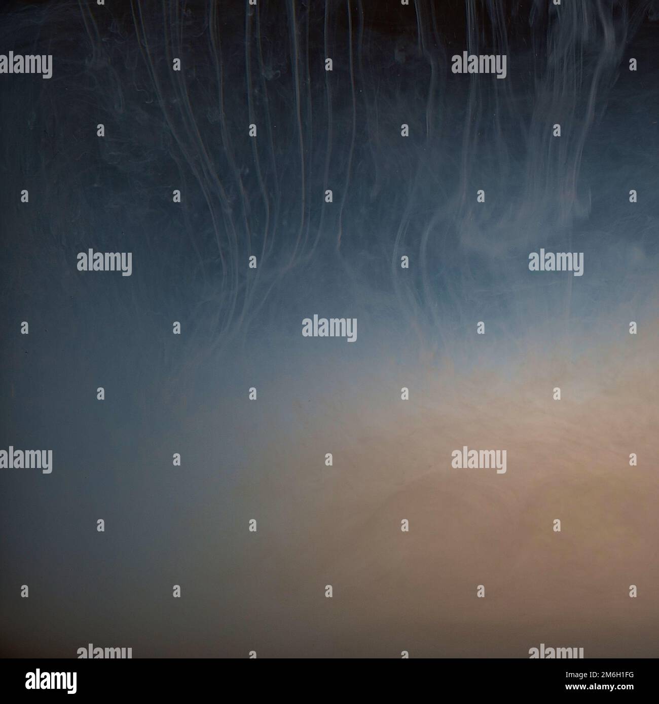 conceptual explosion with white narrow lines of smoke Stock Photo - Alamy