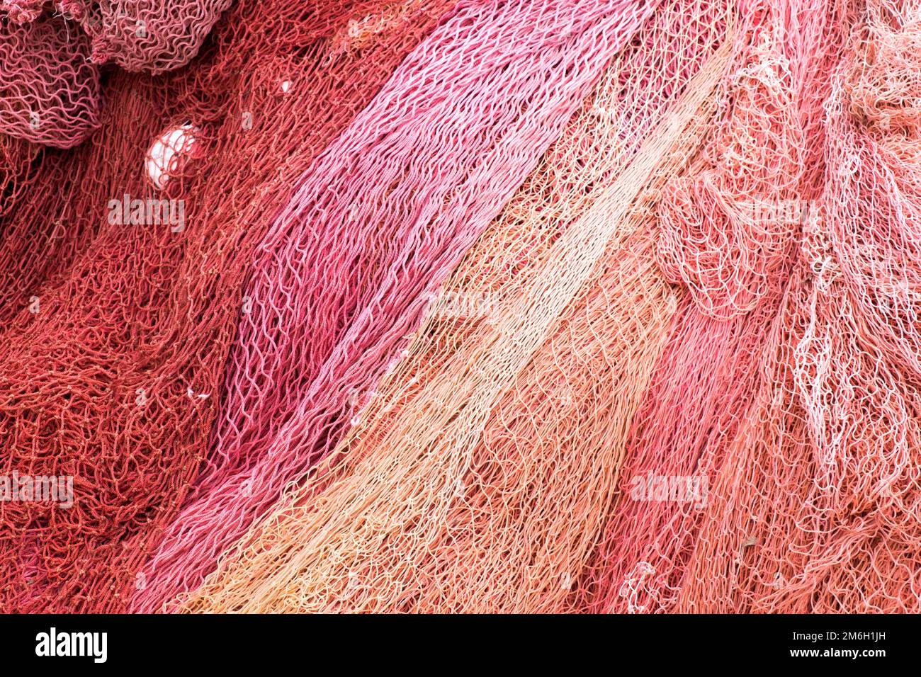Red fishing nets, Brela, Croatia Stock Photo - Alamy