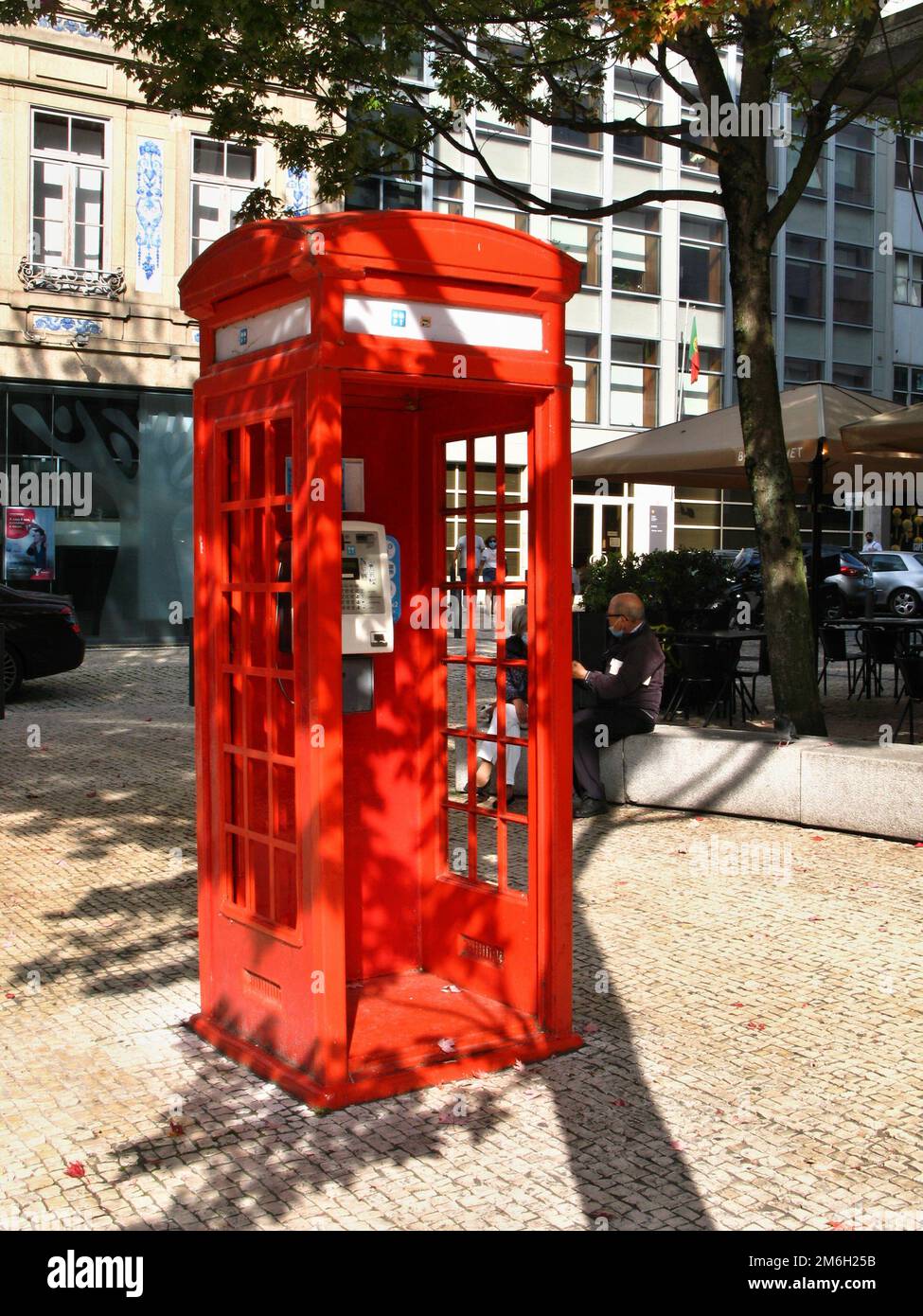 Old red phone booth in Porto - Portugal Stock Photo - Alamy