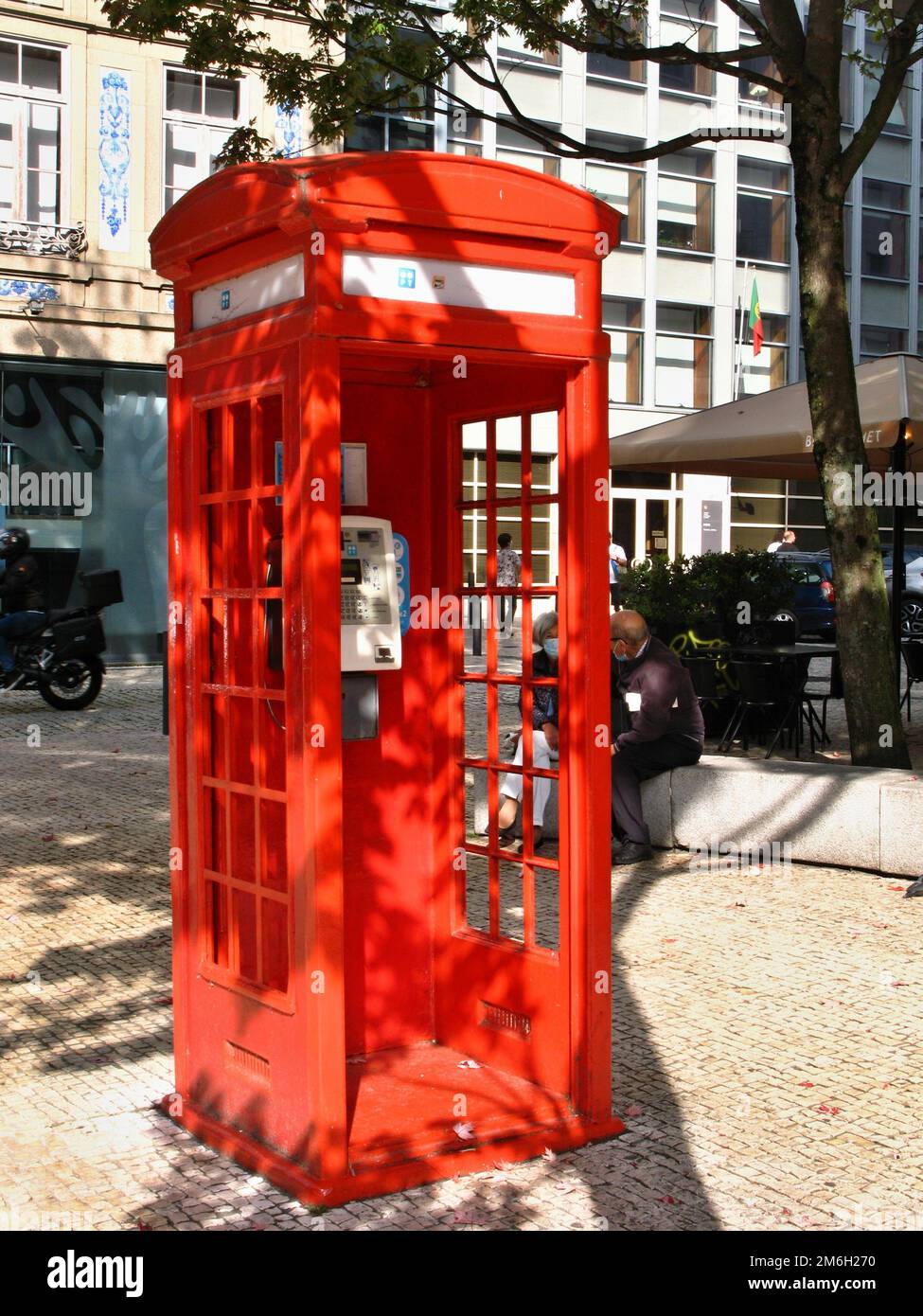 Old red phone booth in Porto - Portugal Stock Photo - Alamy