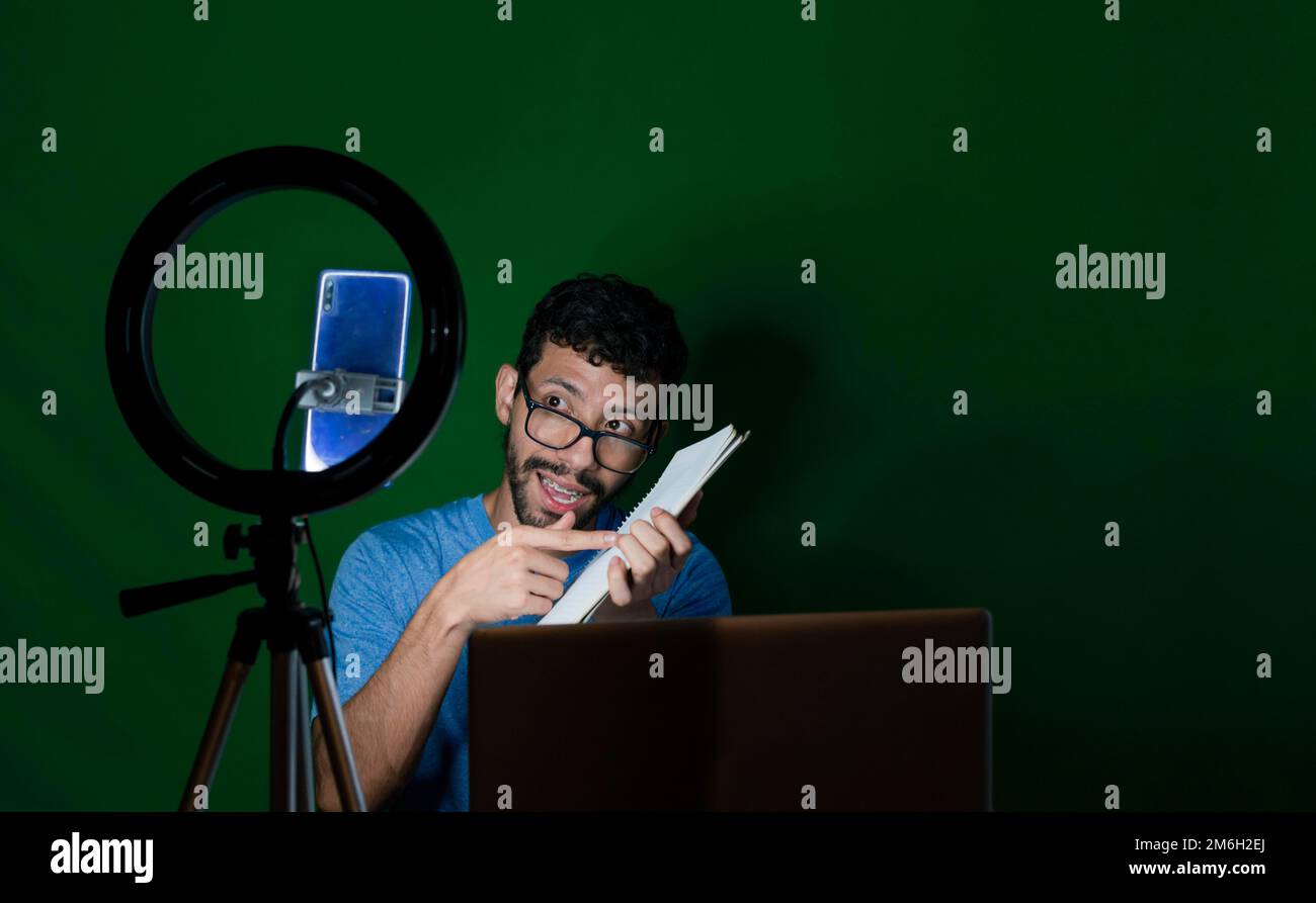 Person giving classes in a video call. Man giving online classes with ...