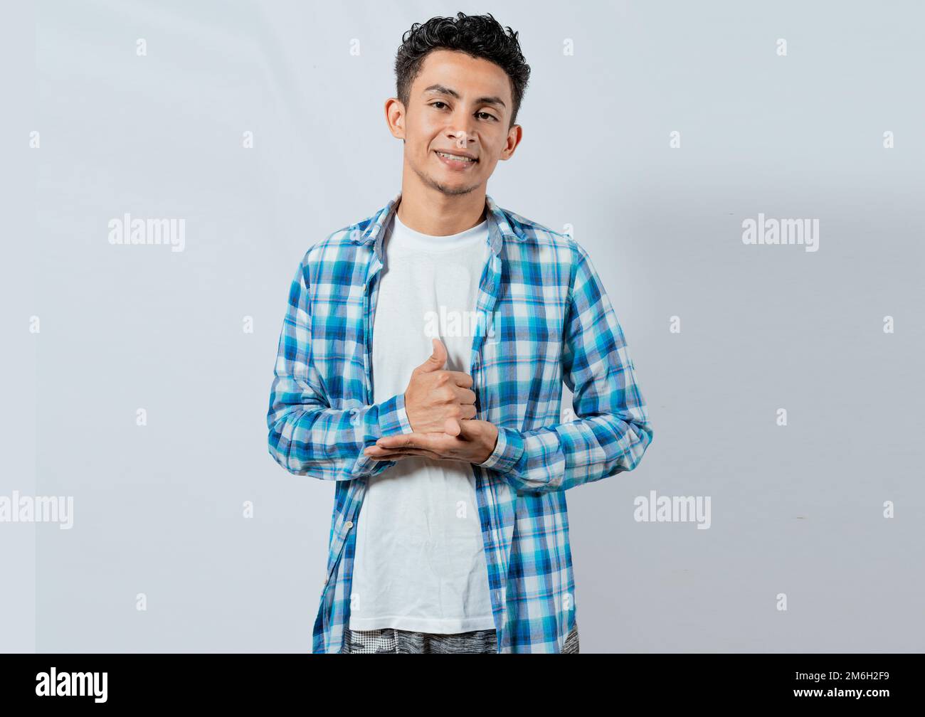 Man gesturing help with hands in sign language, Young man showing help ...