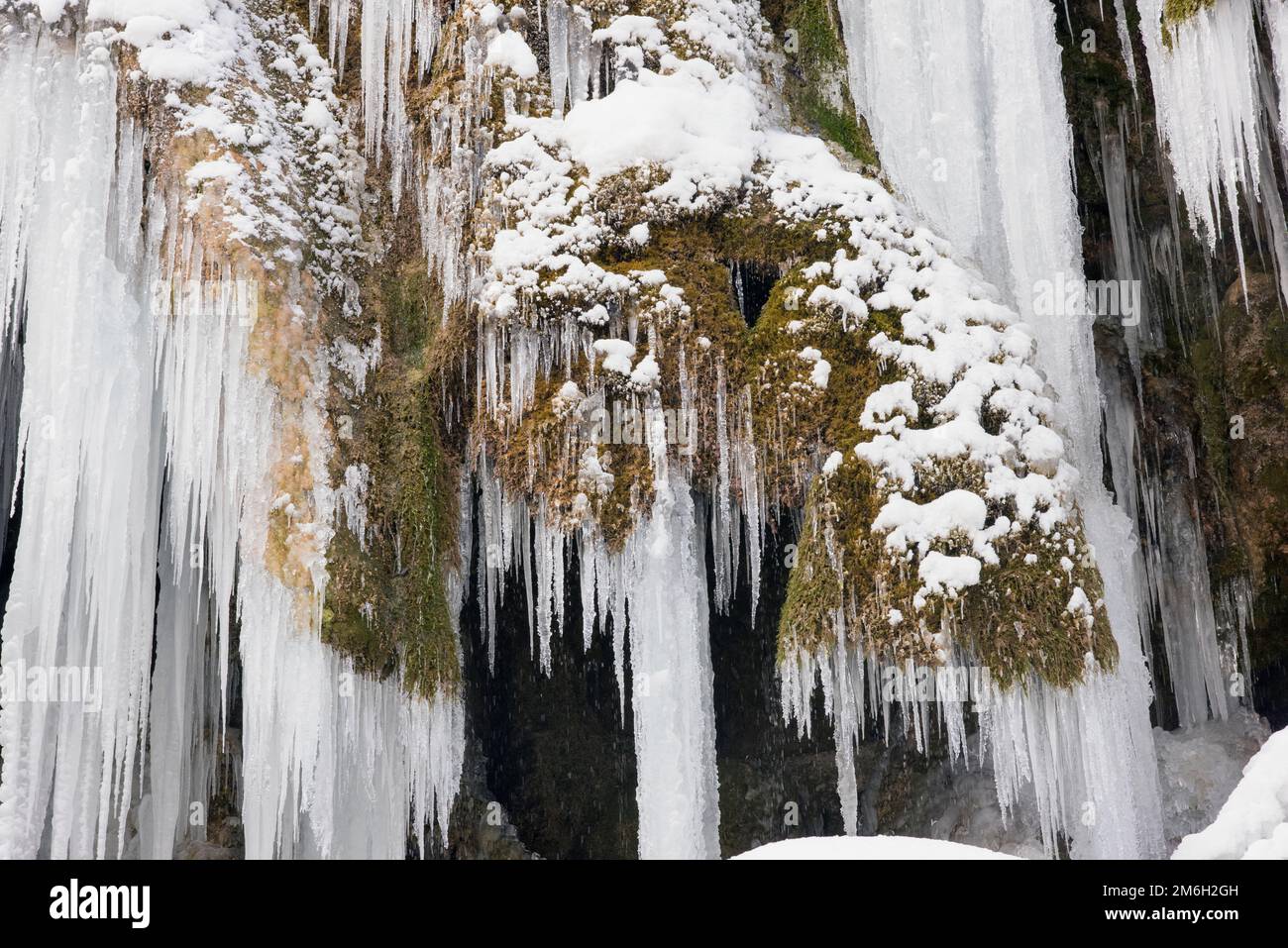 Icicles on a waterfall Stock Photo - Alamy