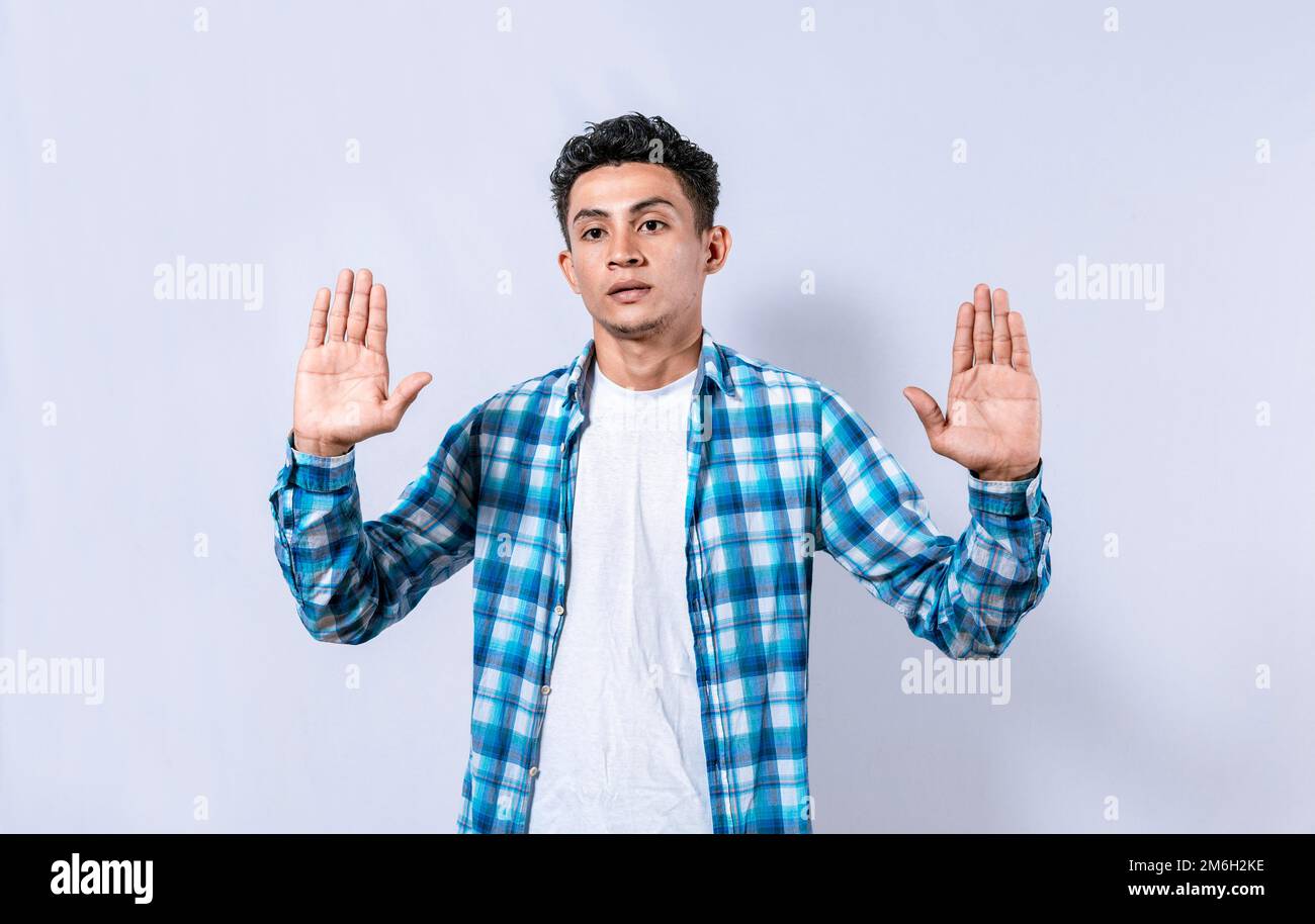 Scared and horrified man with raised palms, Man with a frightened face ...