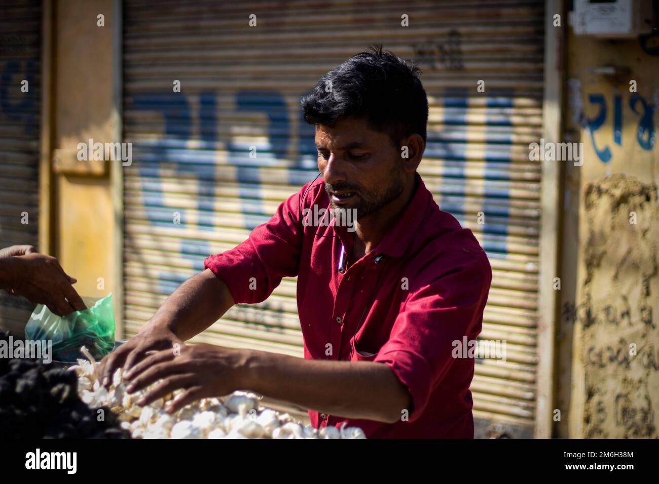 Vadodara, Gujarat - Nov 19th 2022: Indian vendor selling goods in stall ...