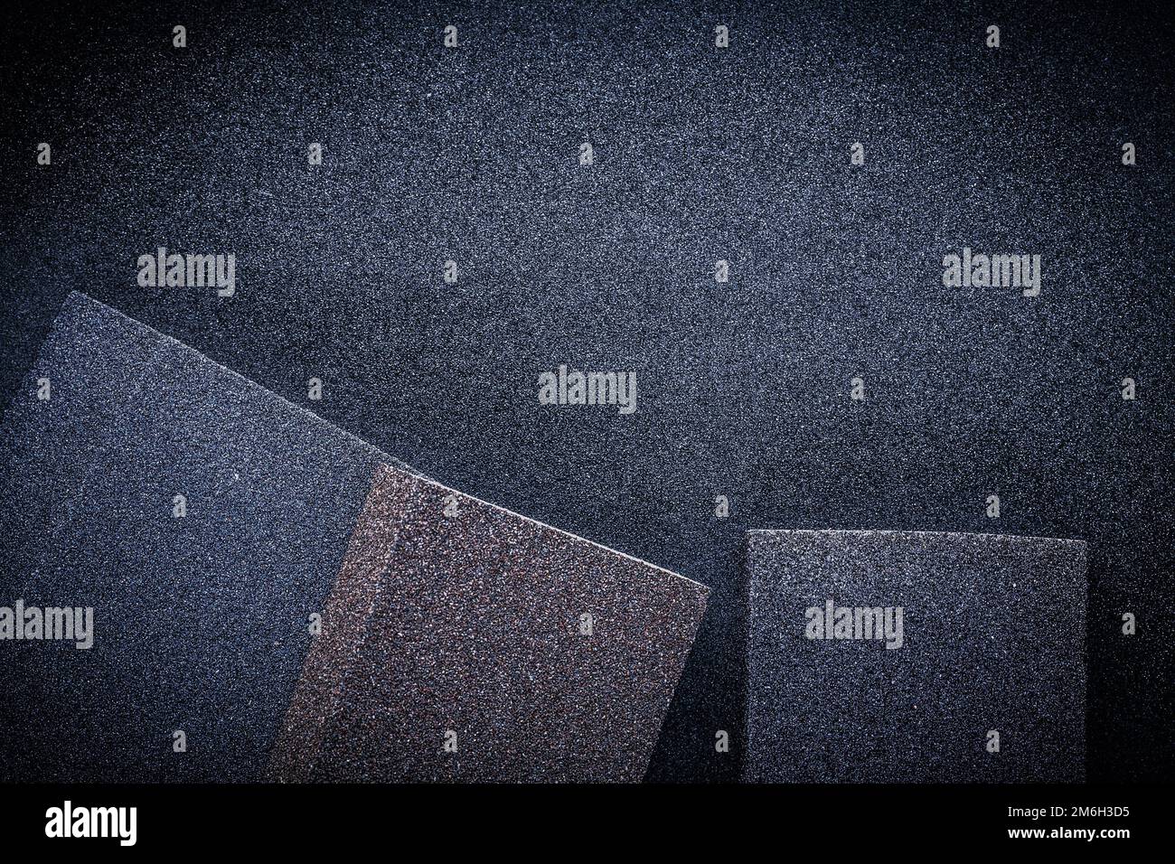 Abrasive sponges on sandpaper Stock Photo - Alamy
