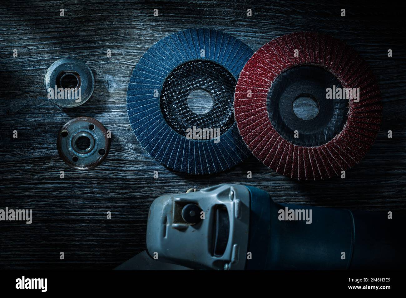 Angle grinder rotary grinding discs on vintage wooden board Stock Photo ...