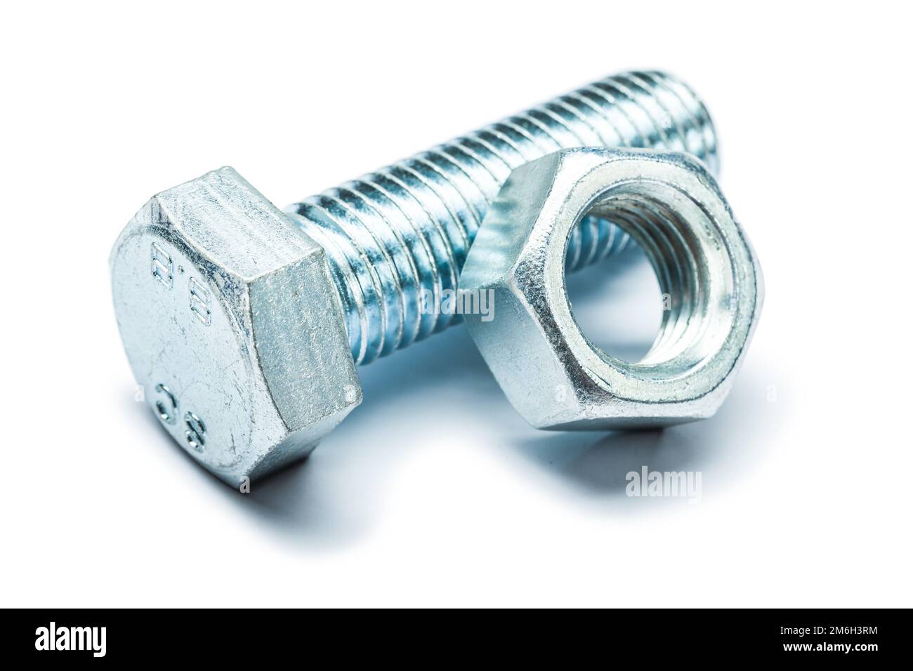 big bolt and nut isolated on white Stock Photo - Alamy