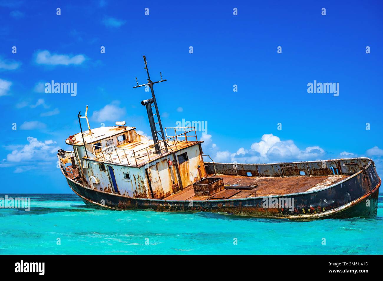 Old abandoned ship aground Stock Photo - Alamy
