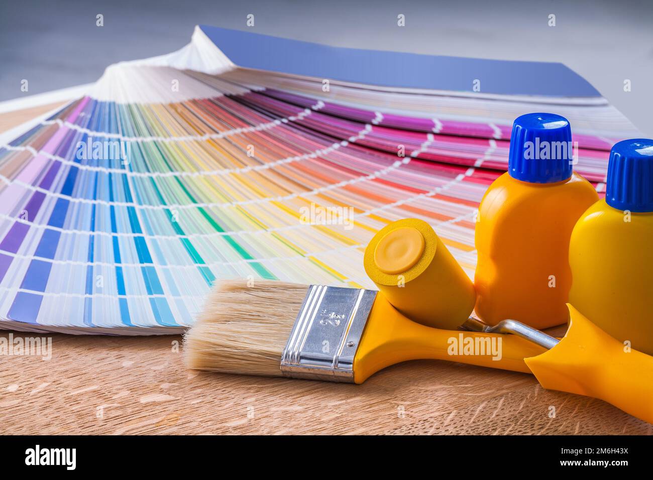 bottles of paint paintbrush paintroller color palette Stock Photo - Alamy