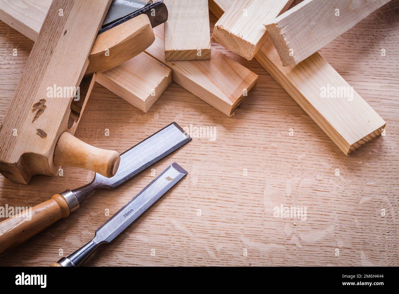 chisels woodworkers plane and planks on wooden board Stock Photo - Alamy