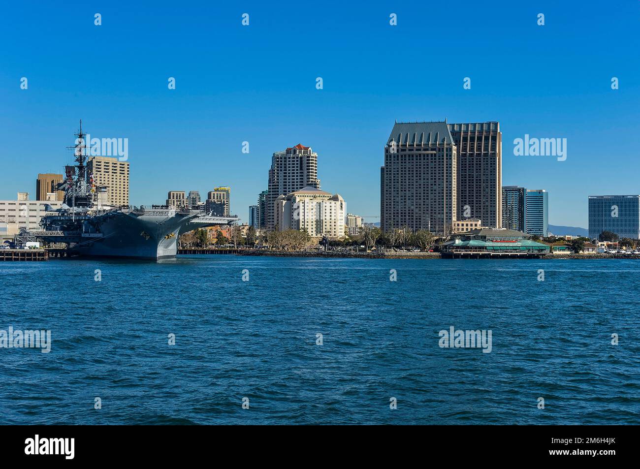 Skyline of San Diego with the USS Midway, California, USA Stock Photo ...