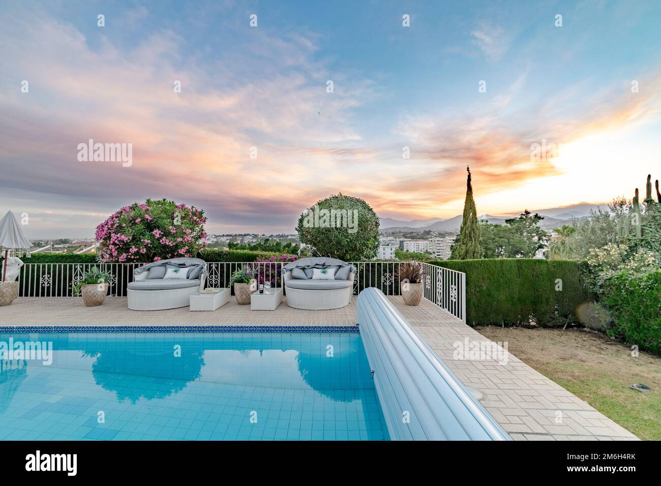 a landscape view of the Costa Del Sol during sunset from around a ...