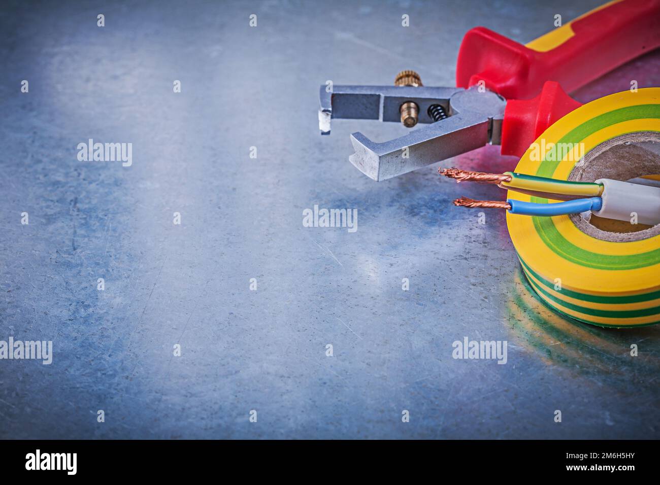 Insulated strippers insulating tape electrical wires on metallic ...