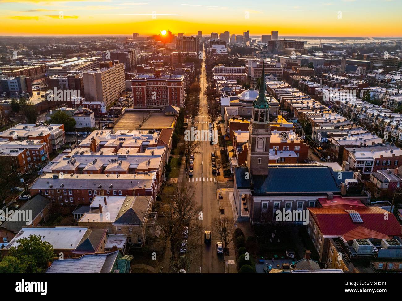 An aerial shot of modern buildings and a tower in the city of Richmond ...