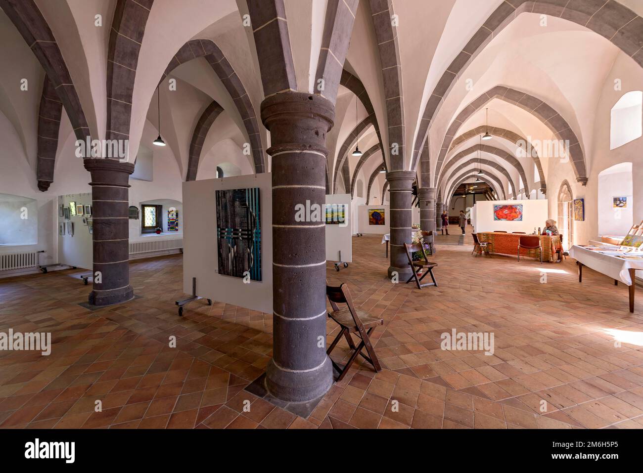 Art exhibition in the dormitory, monks' dormitory, medieval Cistercian ...