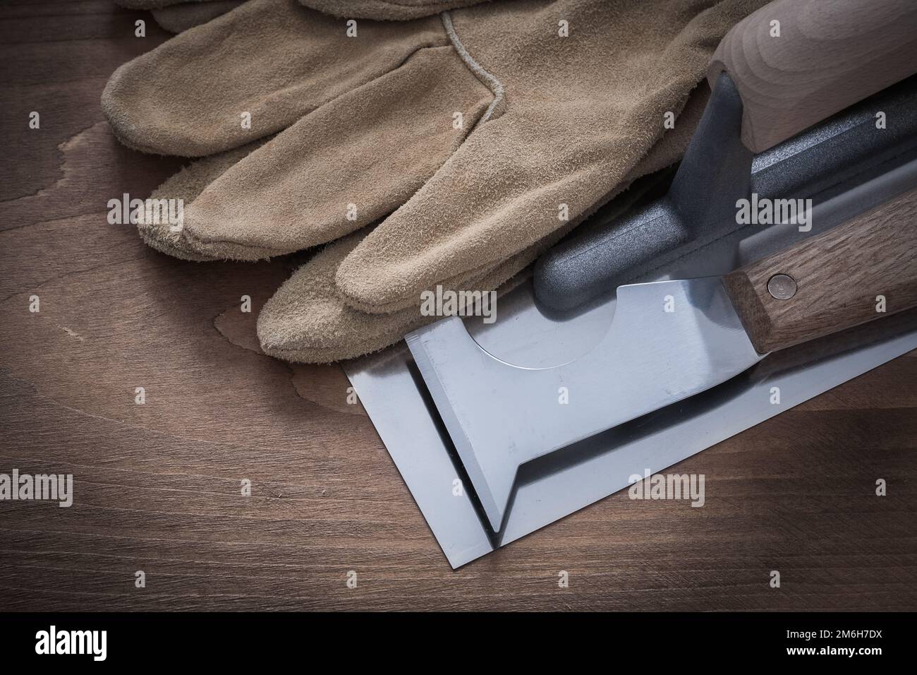 Palette knife plastering trowel and leather safety gloves horizontal ...