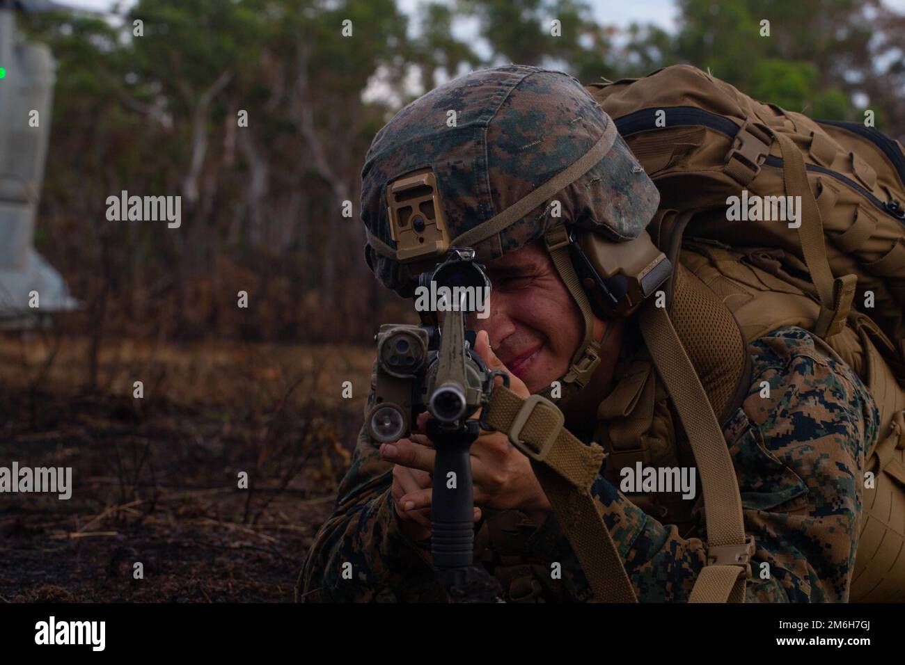 U.S. Marine Corps Lance Cpl. Adrian Ibarra, an assistant gunner with 3d ...