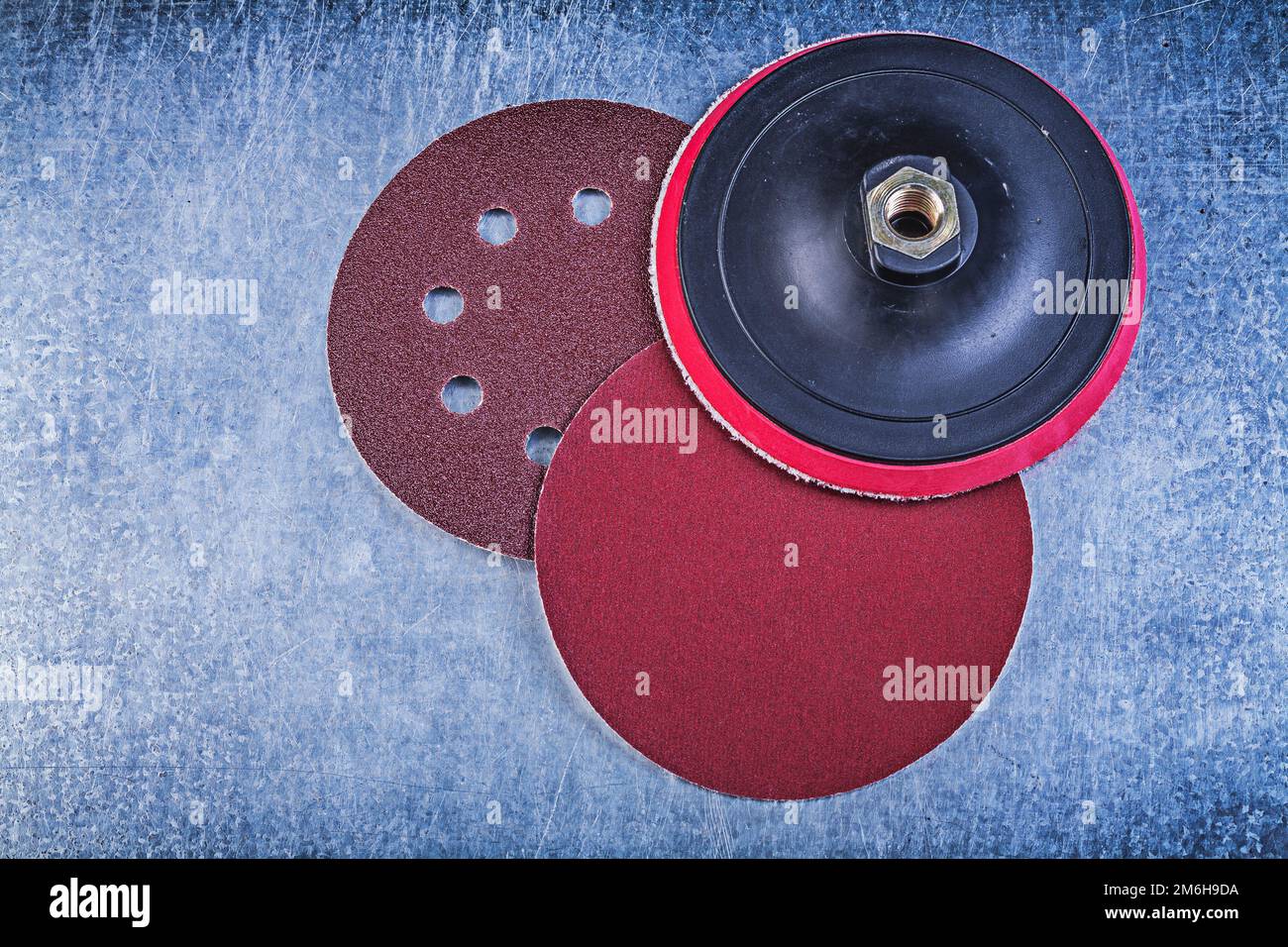 Sanding discs holder on metallic background directly above Stock Photo ...