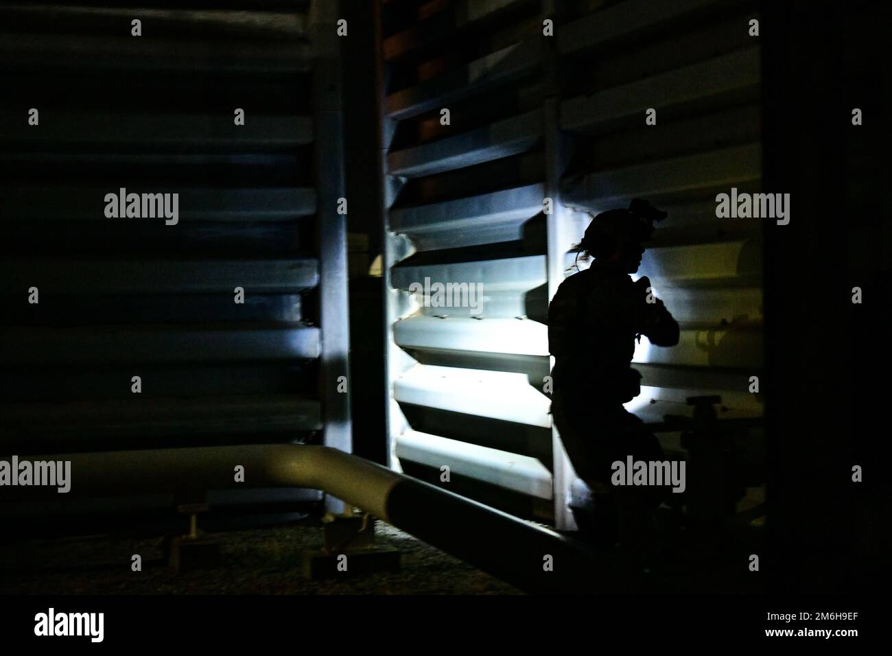 An 8th Security Forces Squadron defender scans the scene during a ...