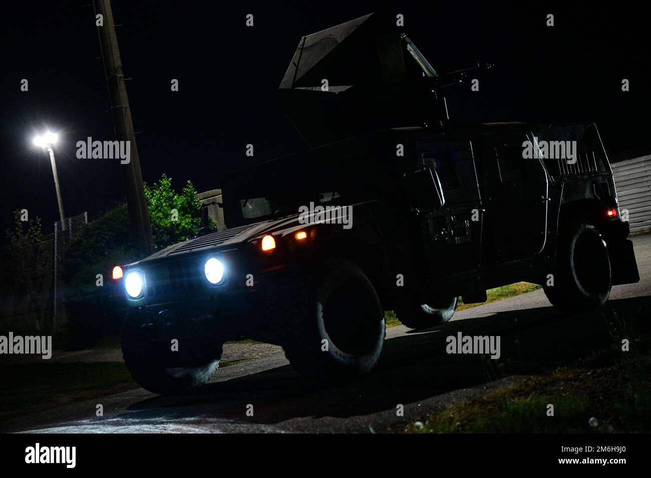 A Humvee carrying 8th Security Forces defenders patrols the perimeter ...