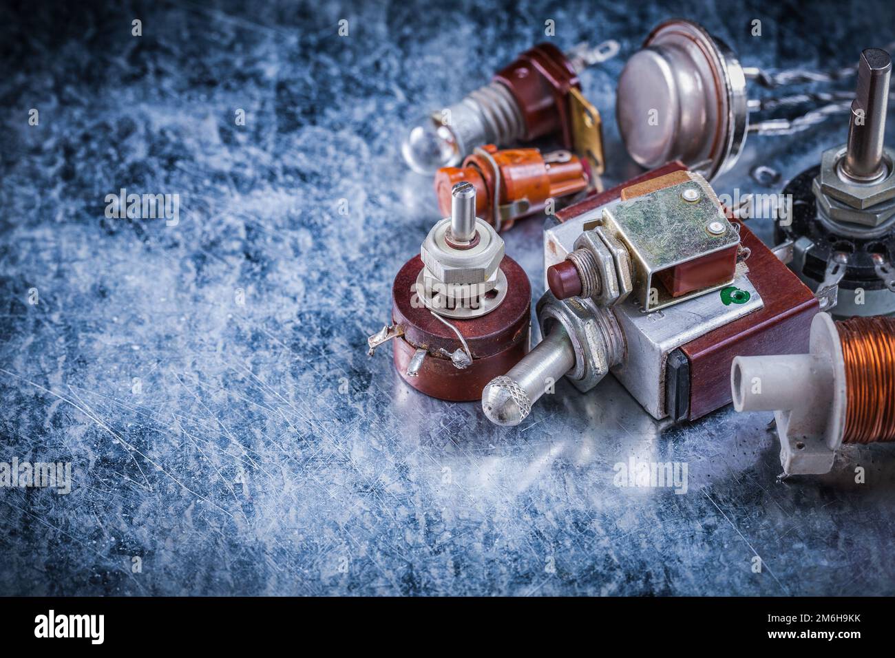 Set of electric devices on metallic background vintage electricity ...