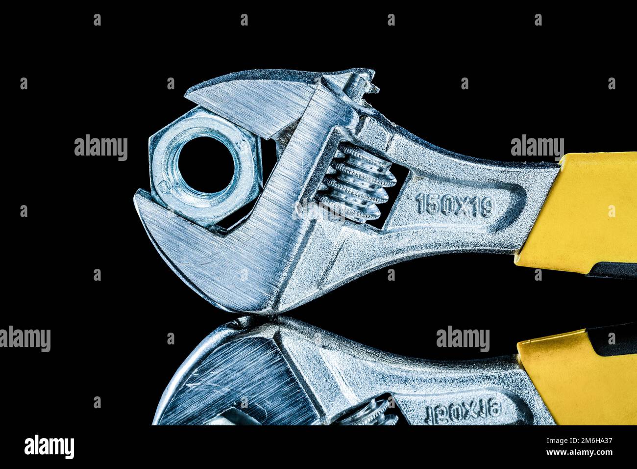 Stainless construction nuts adjustable spanners on black background ...