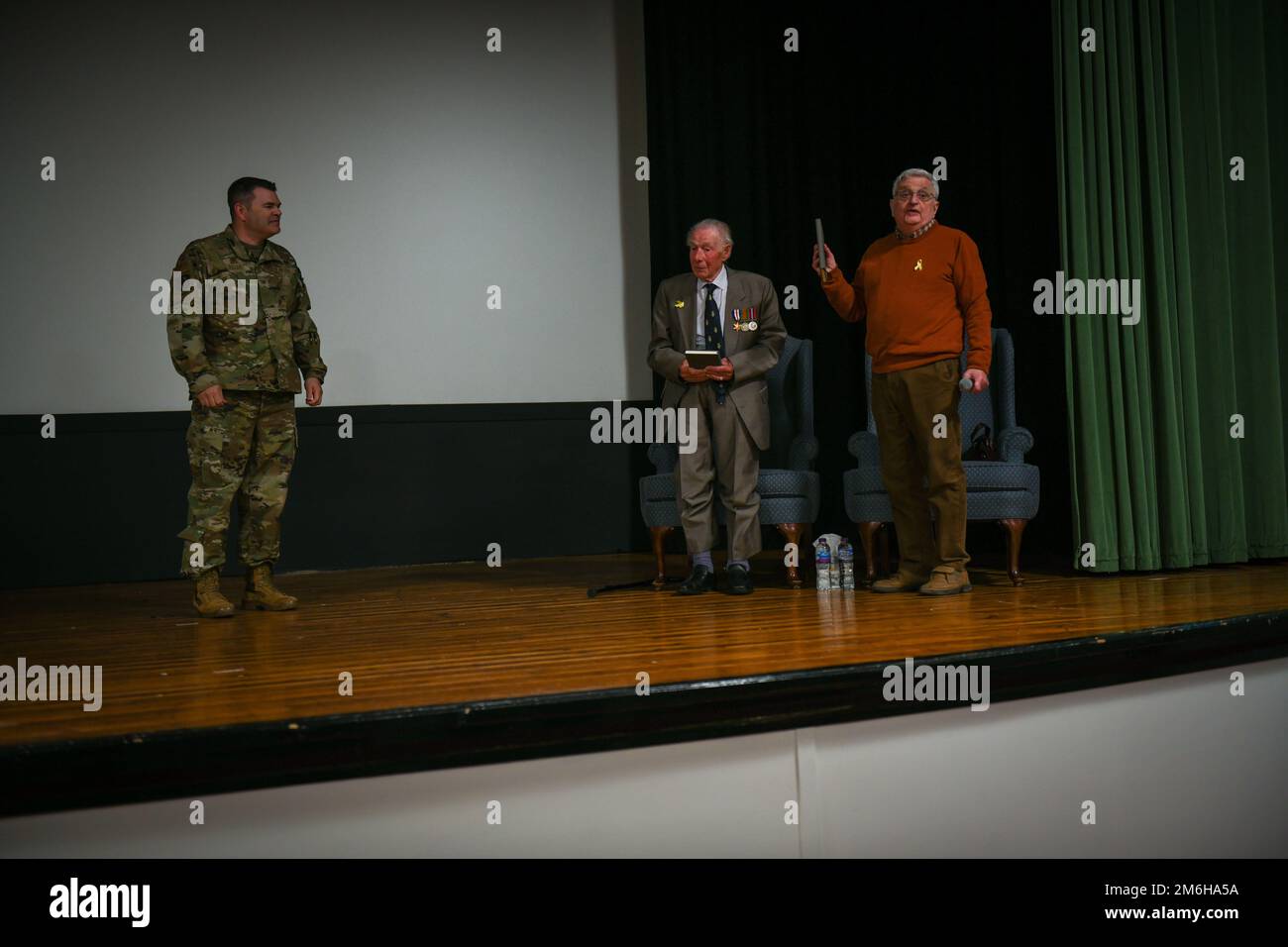 Holocaust survivor Paul Sved, right, speaks to Airmen from the 501st ...