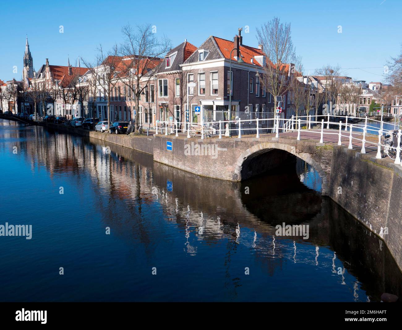Old town with traditional houses along the canal, bridge and reflection ...