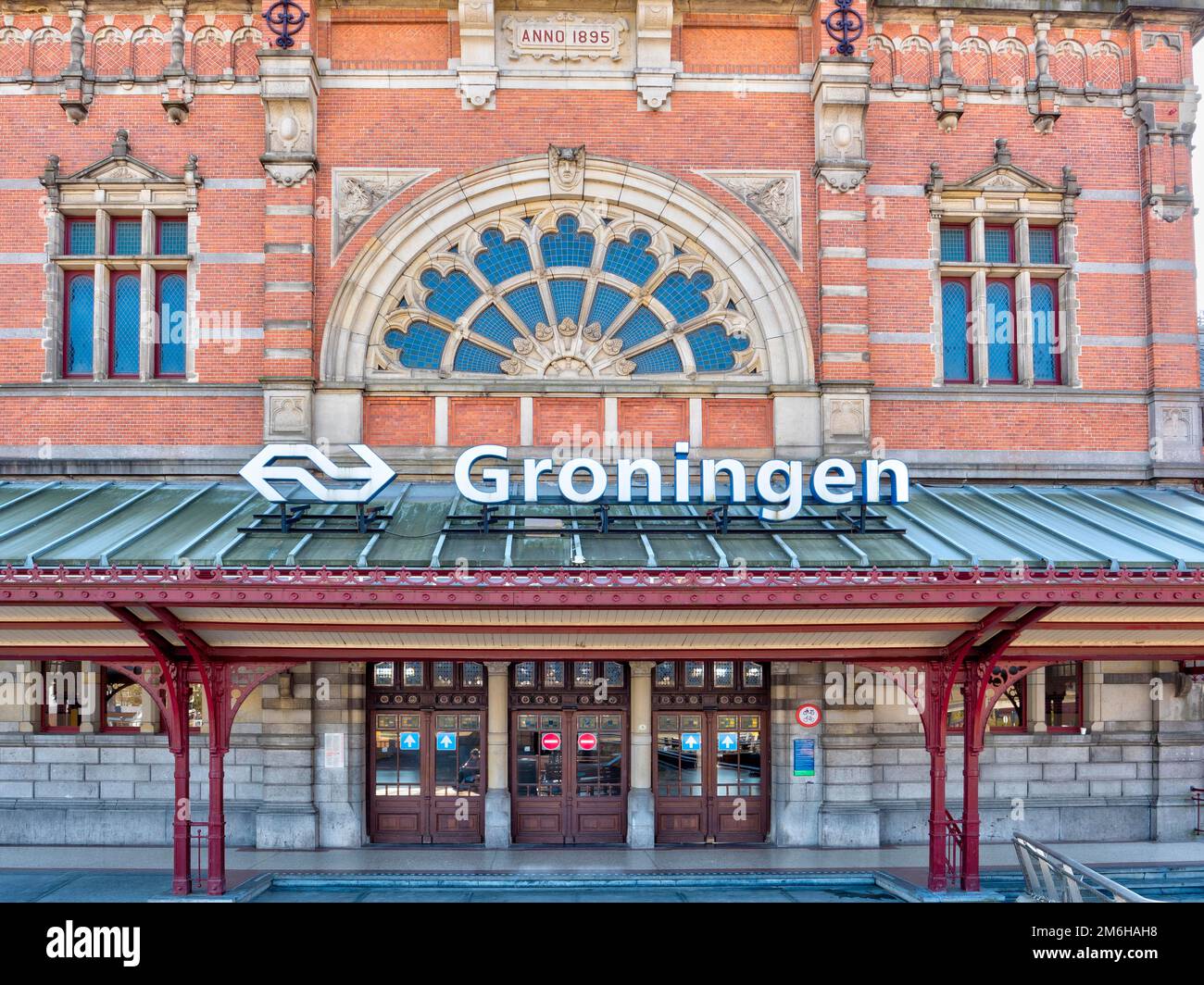 Front view of the building and entrance of Groningen Central Station ...