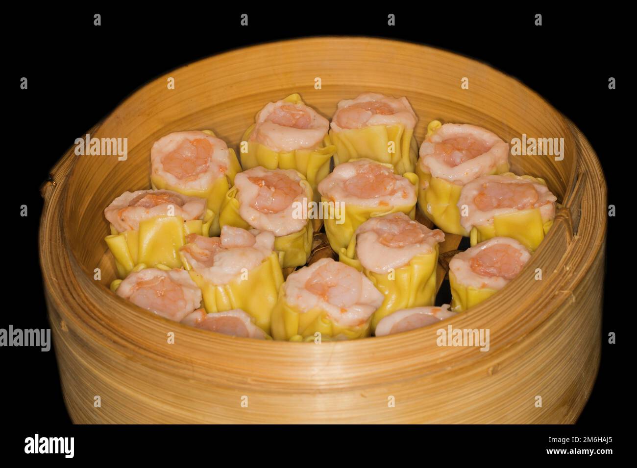Dim Sum with fish farce and prawns, food photography with black ...