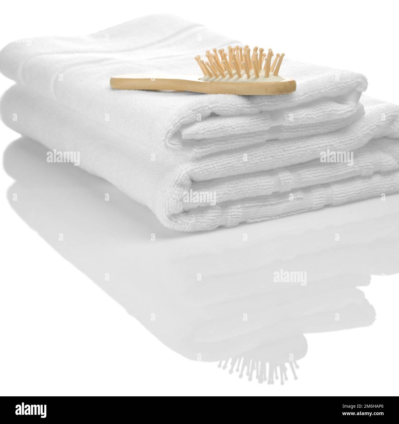 two towels and hairbrush Stock Photo - Alamy