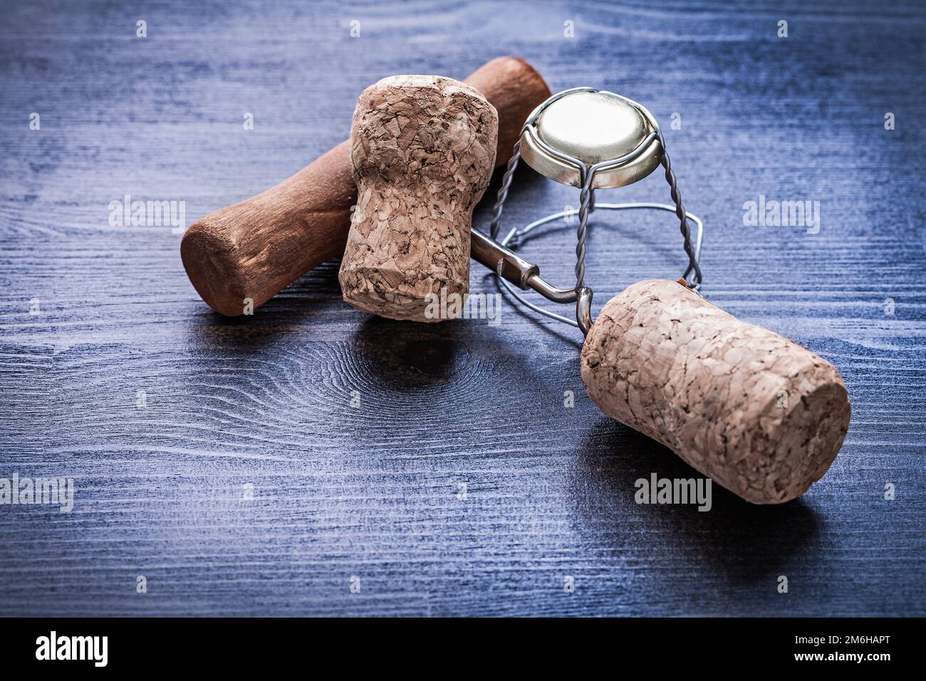 two corks of champagne wires and corckscrew Stock Photo - Alamy