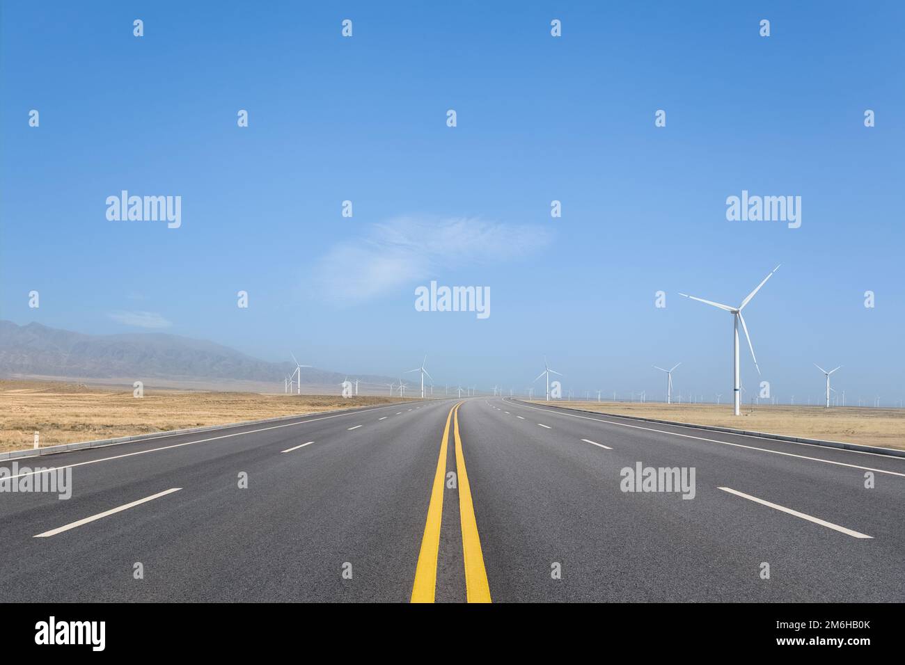 Road through a wind farm Stock Photo - Alamy