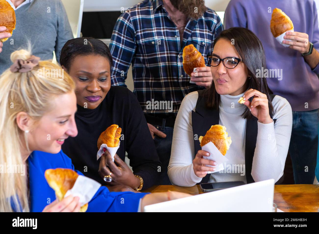 Multi Ethnic Group Of Coworker Colleagues On Their Lunch Break While