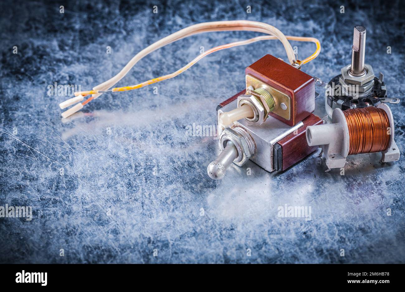 Vintage electric toggle switch transformer on metallic background ...