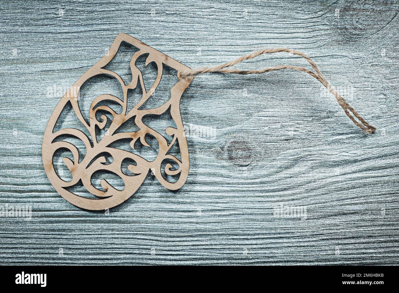 Vintage wooden New Year mitten string on wood board celebrations ...