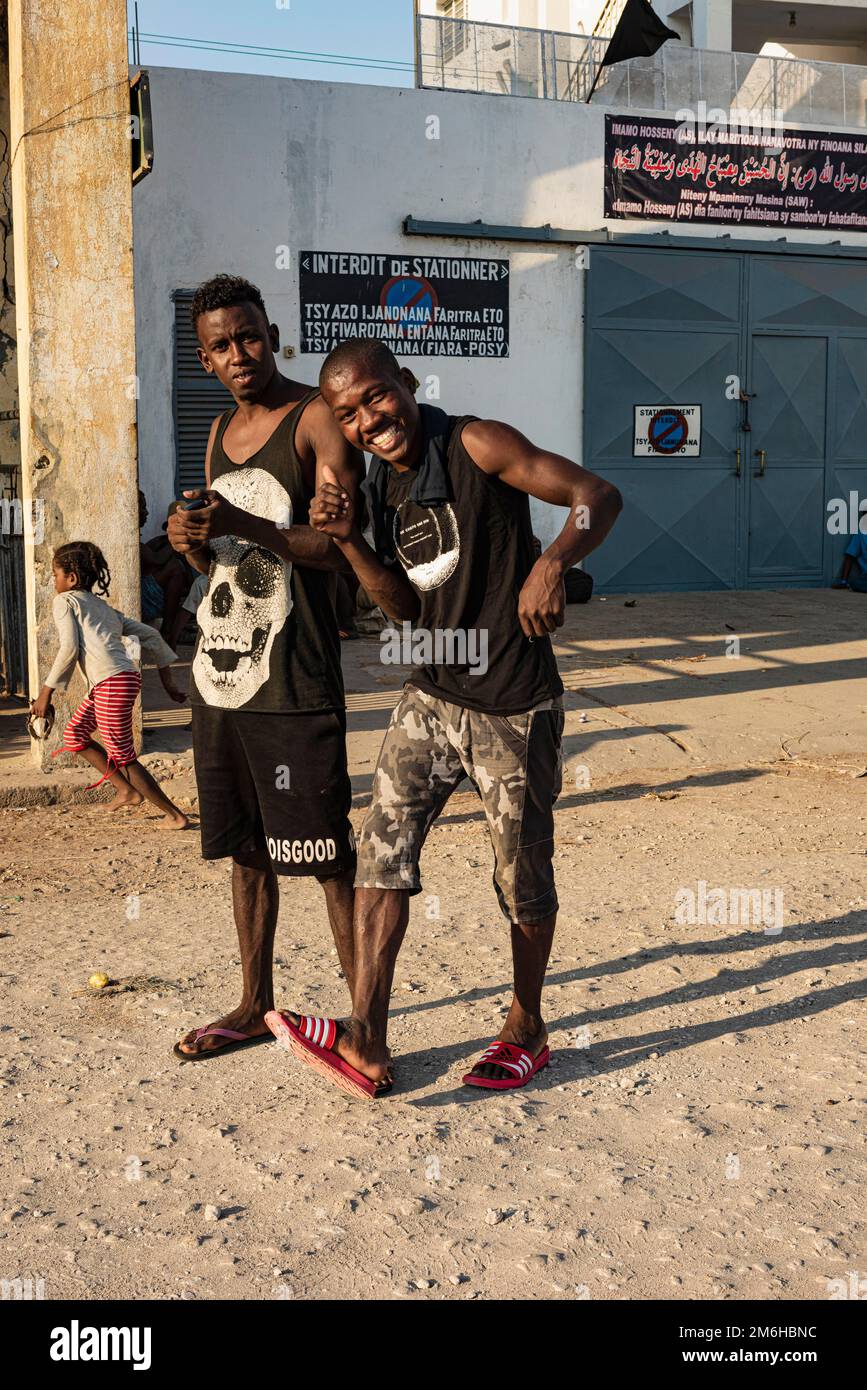 Two young men, laughing, Mahajanga, Madagascar Stock Photo - Alamy