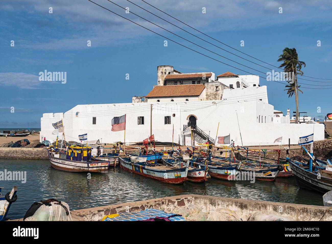 Fishing boats, pirogues, back Elmina Castle, St. George's Castle ...